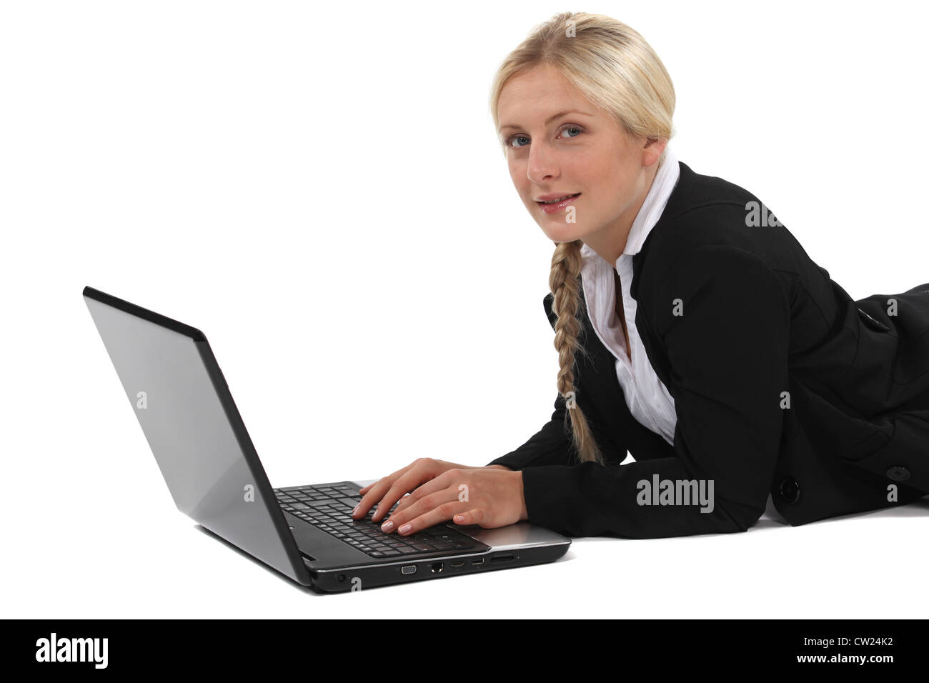 Businesswoman laid in front of computer Stock Photo - Alamy