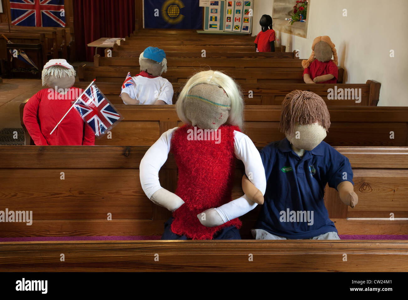 St Mary's Church, Kettlewell. Stuffed straw dolls sat in pews at ...
