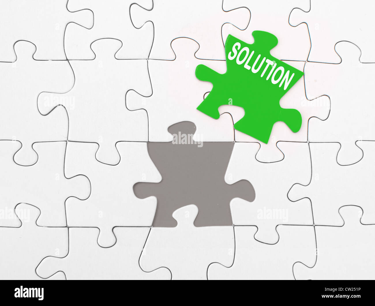 Green jigsaw puzzle solution hi-res stock photography and images - Alamy