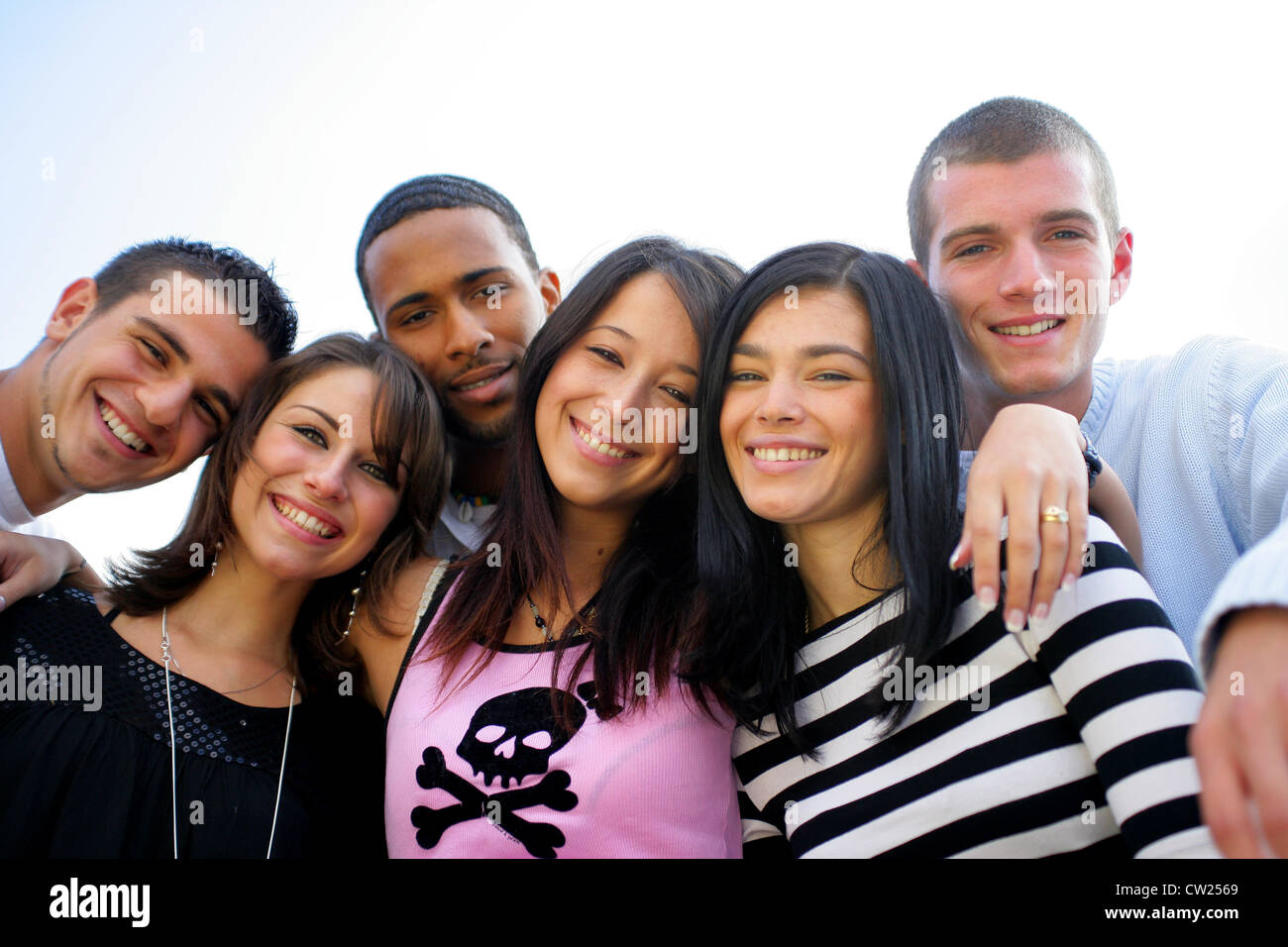 group of young people posing for photo Stock Photo - Alamy