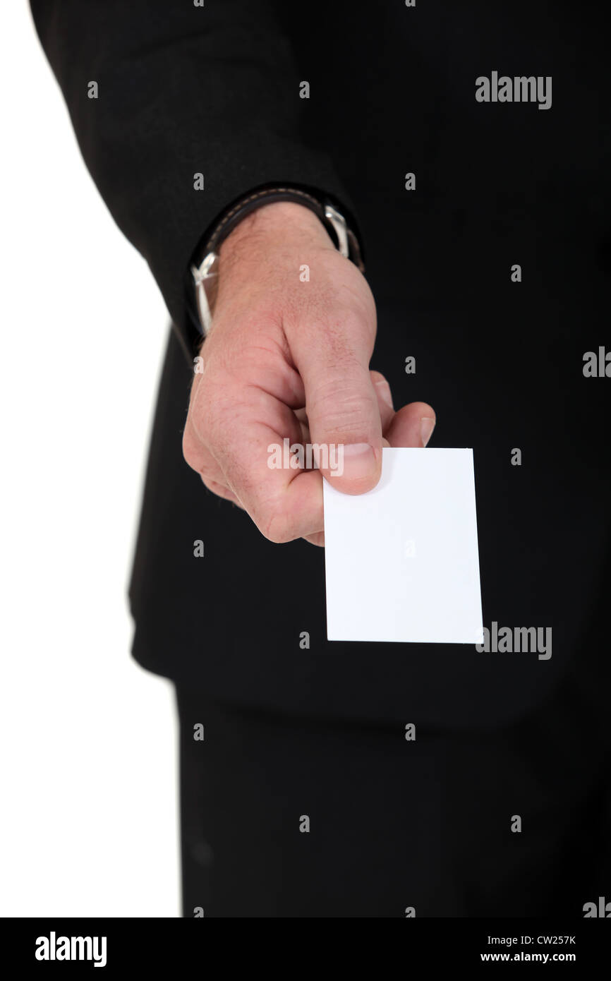 Hand of a man giving business card Stock Photo - Alamy
