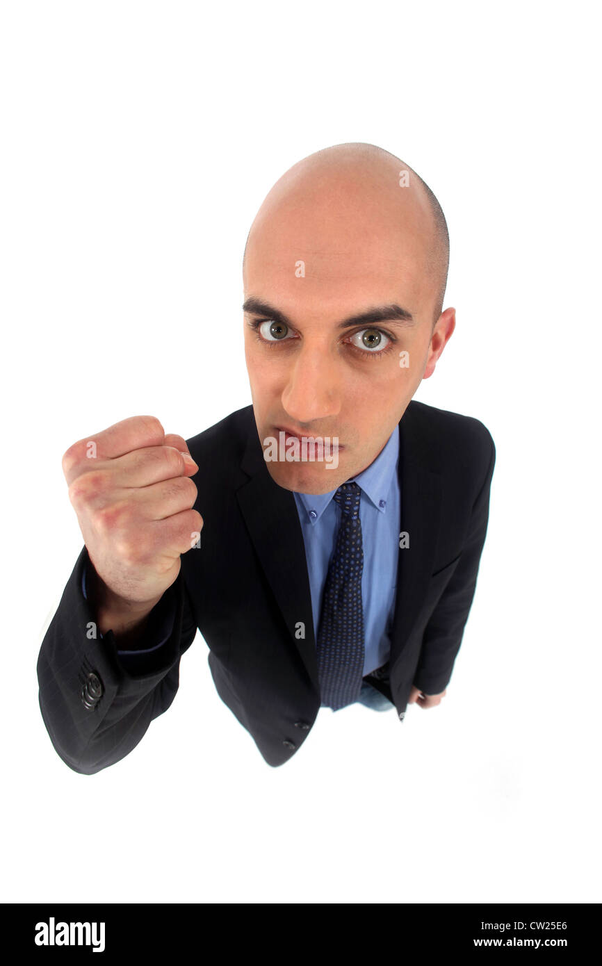 Angry bald businessman Stock Photo - Alamy
