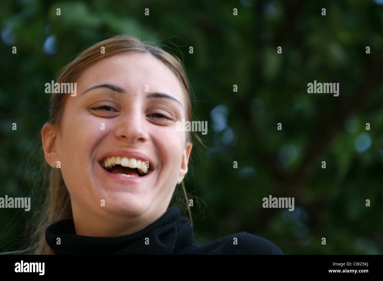 portrait of a woman smiling Stock Photo - Alamy