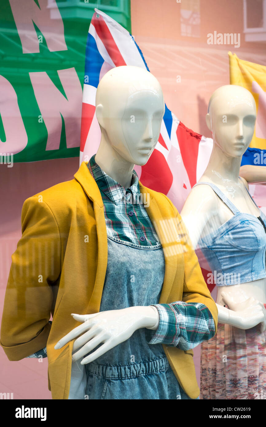 Mannequin dummies in a shop window Stock Photo - Alamy