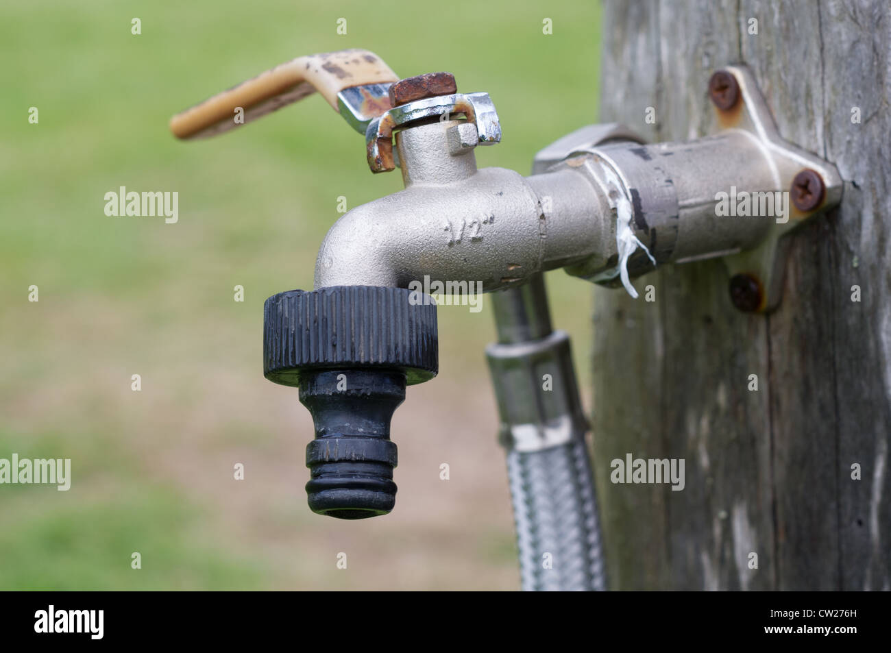 Old tap in the garden without water Stock Photo - Alamy