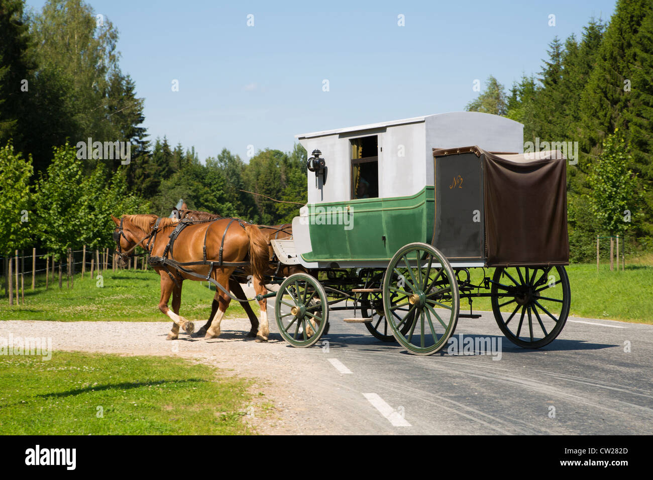 Wagon is making left turn from main road Stock Photo - Alamy