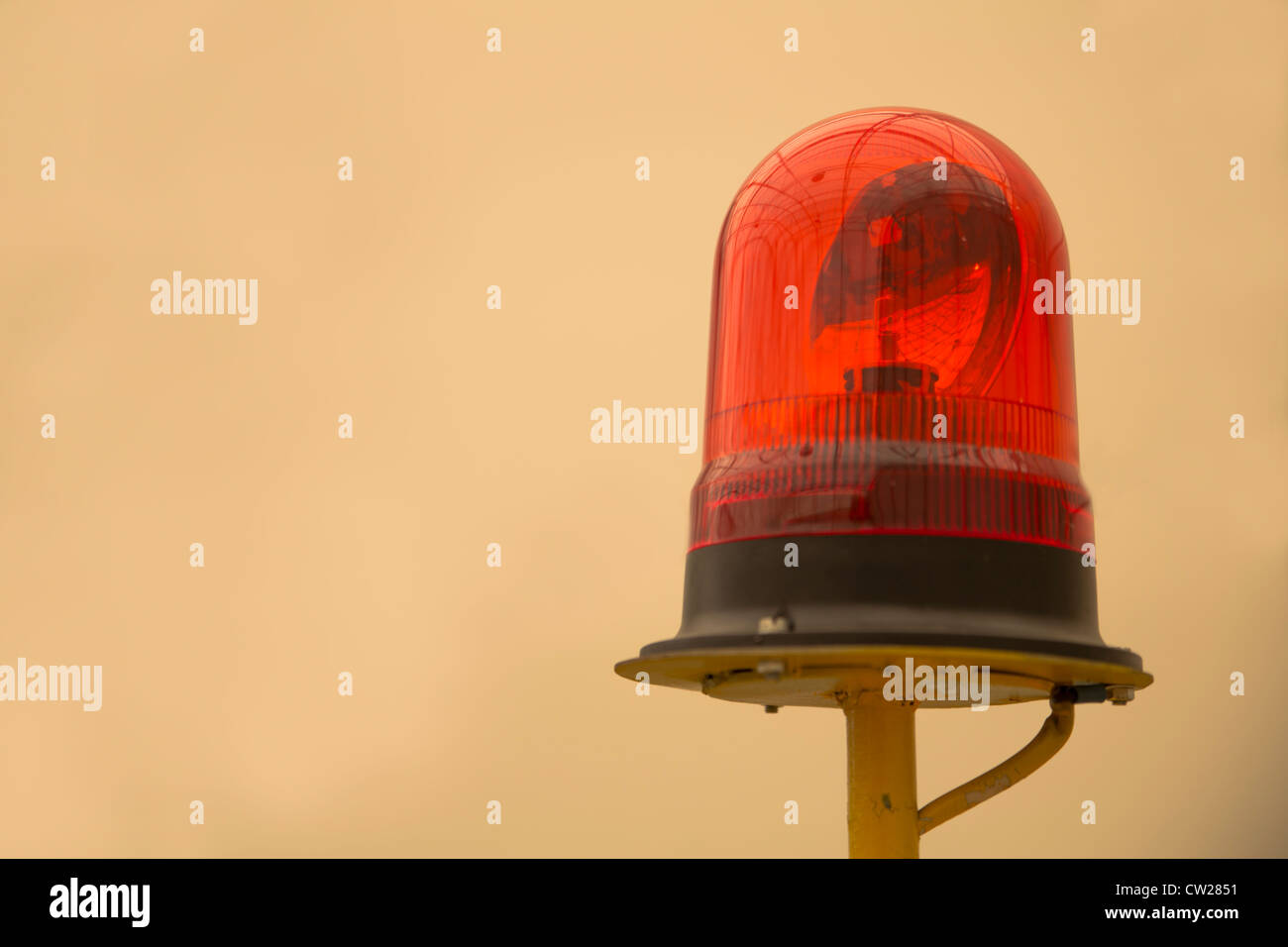 Red beacon on yellow metallic rod warning seekers Stock Photo - Alamy