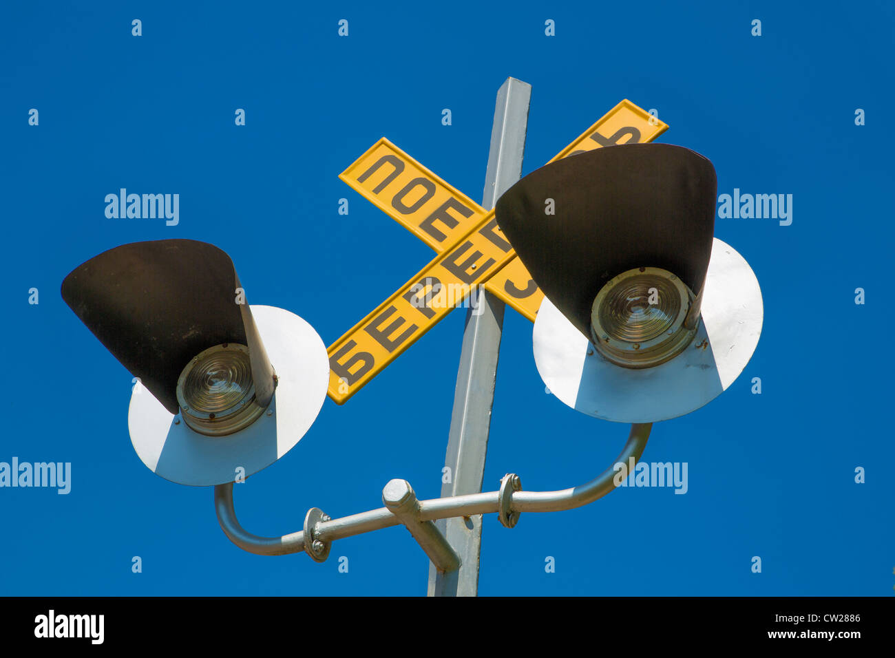 Lights which warning car drivers about coming train Stock Photo - Alamy