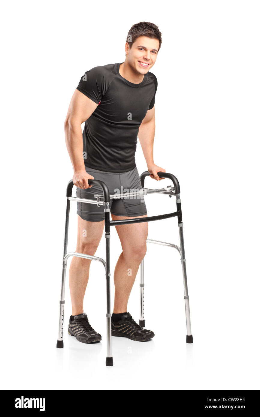 Full length portrait of a young smiling athlete using a walker isolated ...