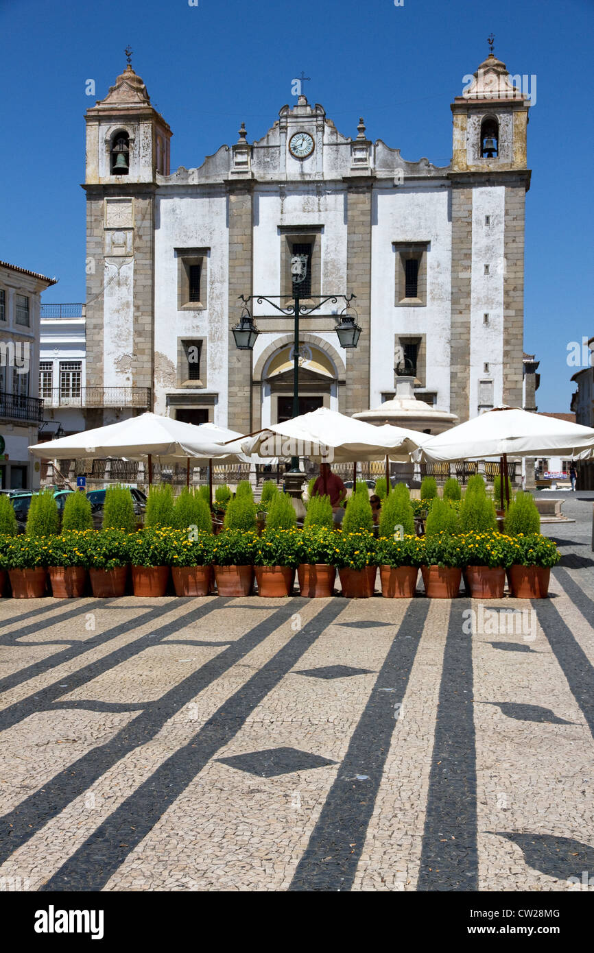 Evora. Central square, St Anton's Church and cafes , Praca do Giraldo ...