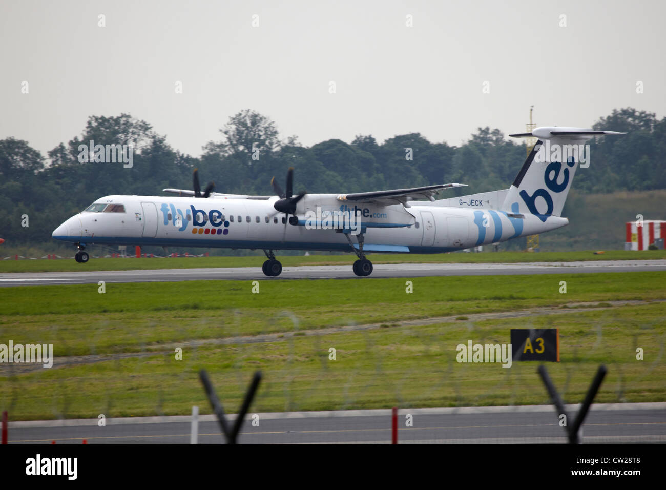 Flybe landing at Manchester Airport Stock Photo - Alamy
