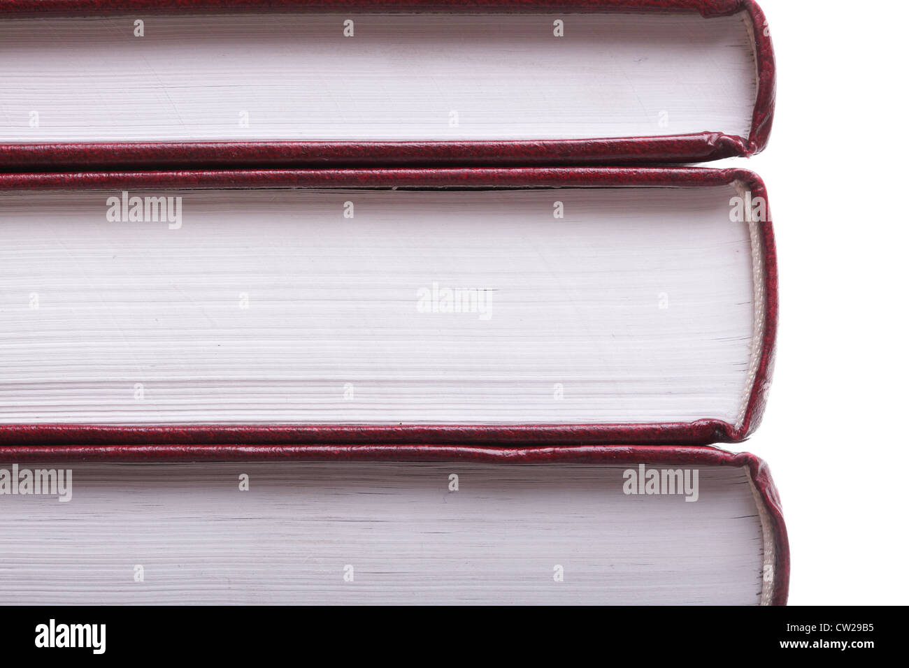 Isolated on white stack red book library object Stock Photo - Alamy
