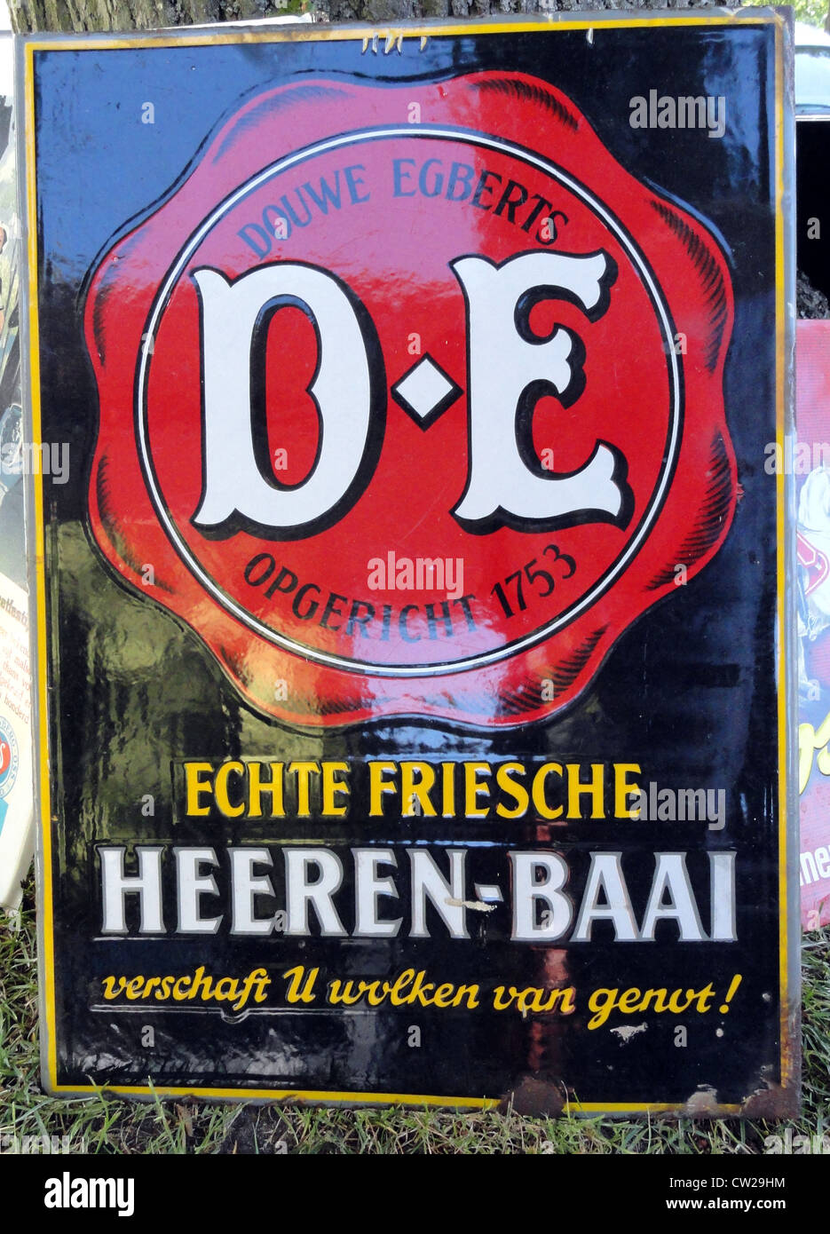 This enamel advertising sign from a cafe company features vintage ...