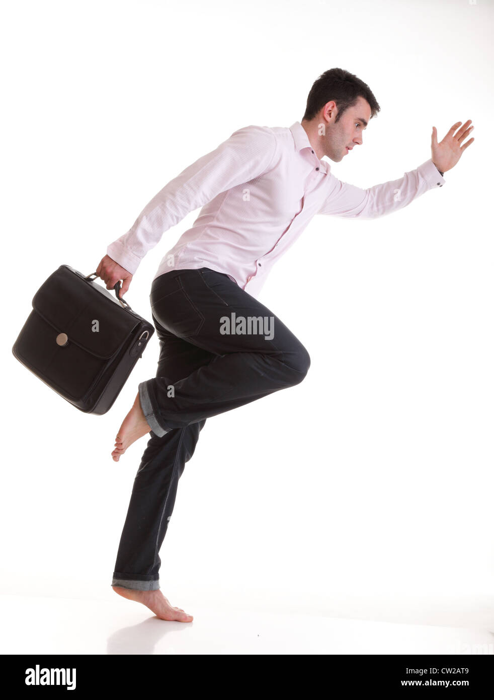 Businessman running with a briefcase, isolated on white background ...