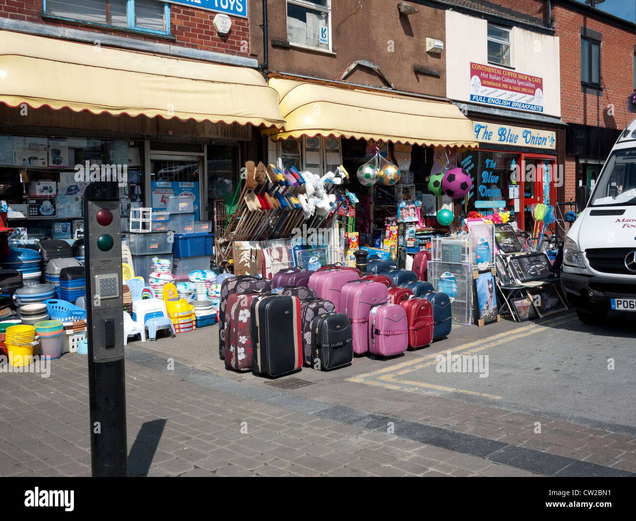 Shops in Oldham Town centre with goods outside, Oldham,Lancashire ...