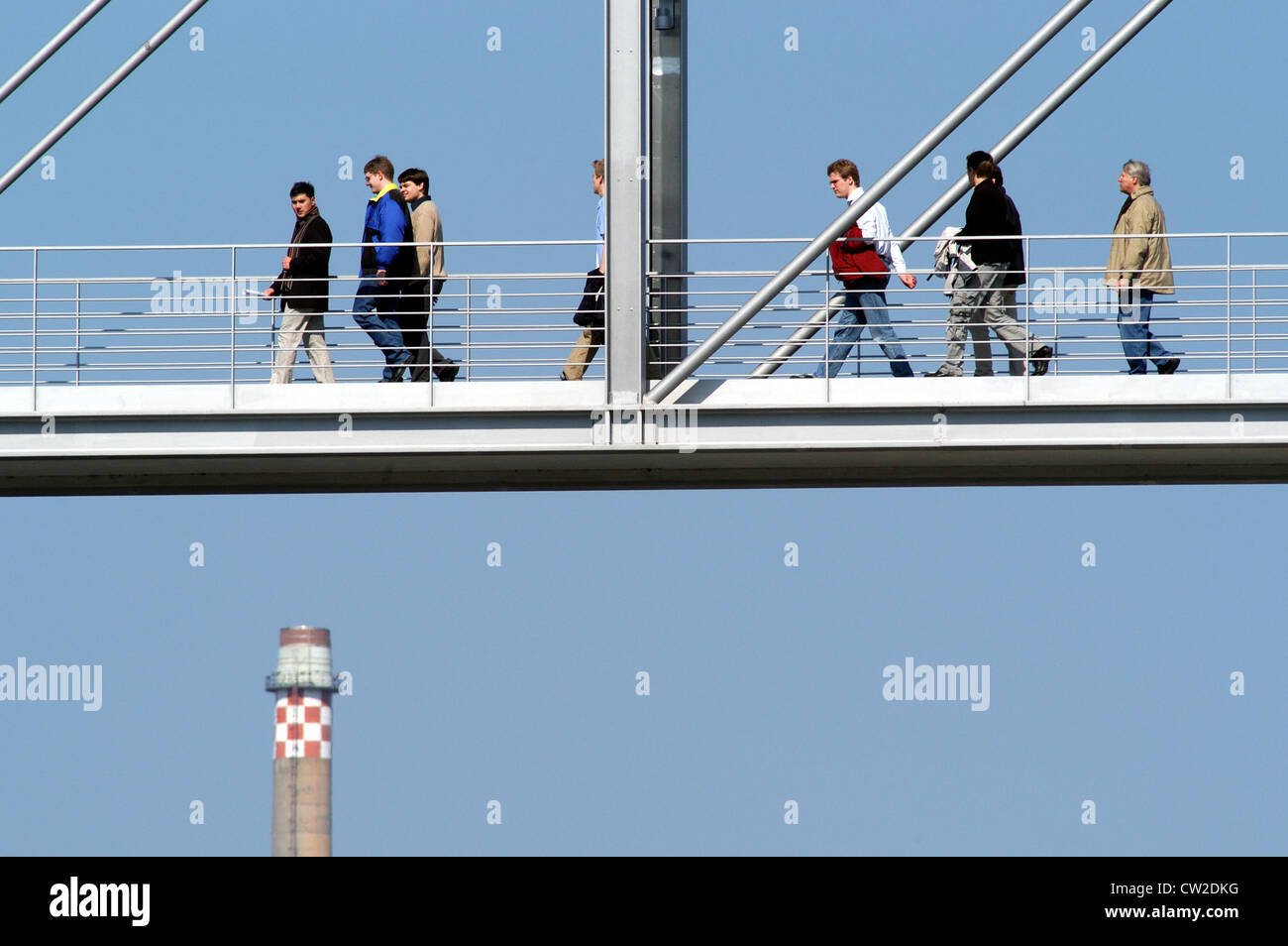 People walking over a bridge Stock Photo - Alamy