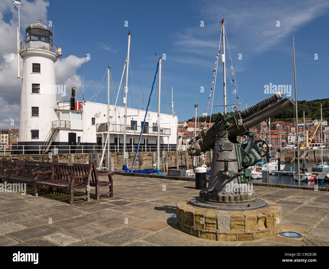Scarborough Lighthouse and WW1 naval gun Yorkshire UK Stock Photo - Alamy