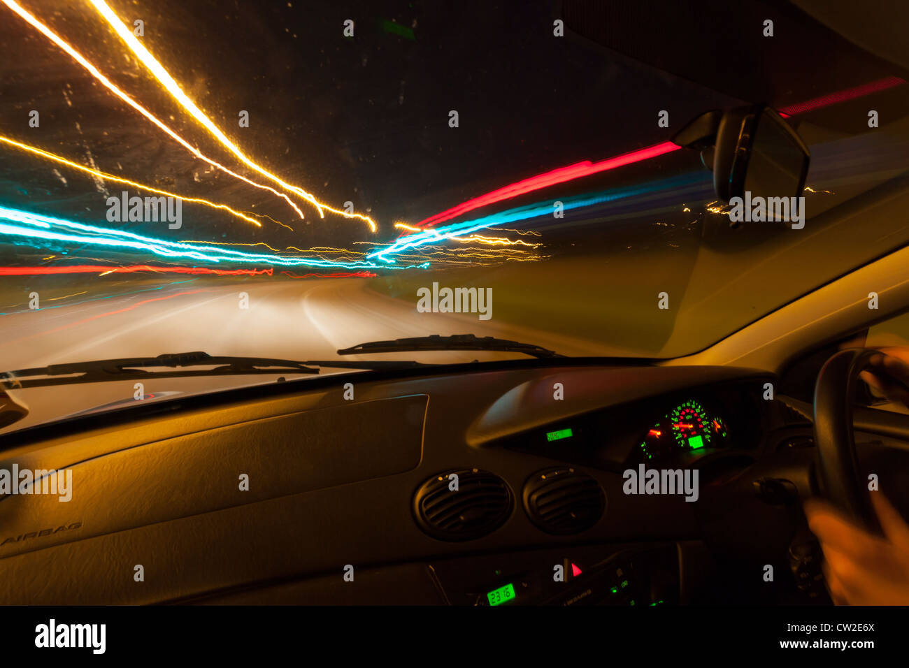 Light trails seen through a car window at night Stock Photo - Alamy