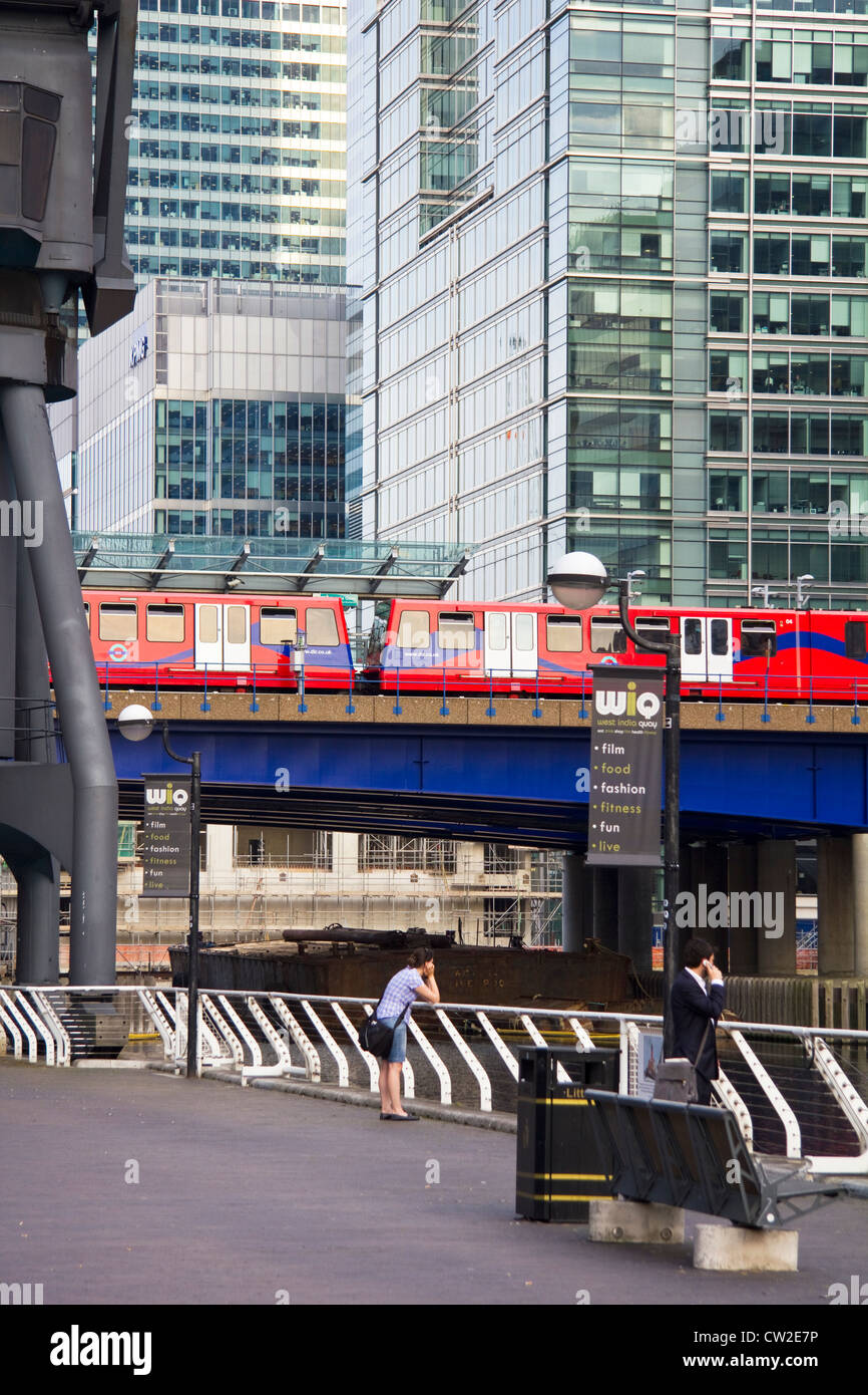 DLR train on bridge, Canary Wharf, London, UK Stock Photo - Alamy