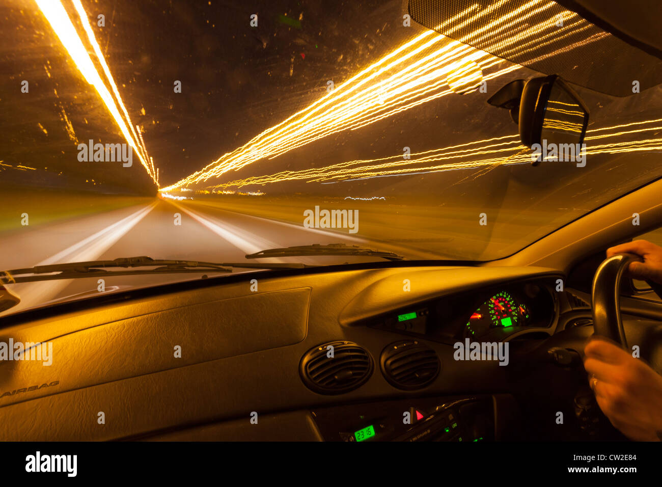 Light trails seen through a car window at night Stock Photo - Alamy