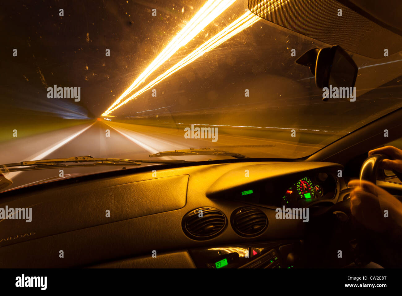 Light trails seen through a car window at night Stock Photo - Alamy