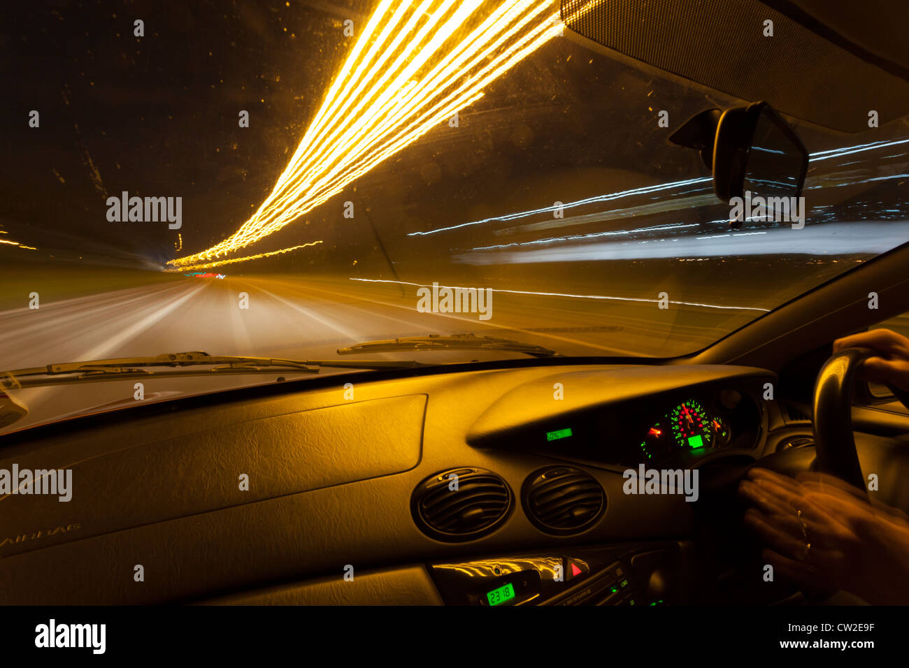 Light trails seen through a car window at night Stock Photo - Alamy