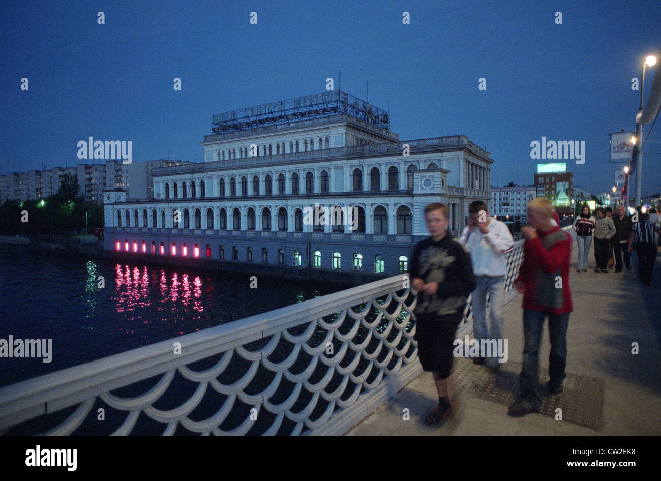 Young people on a bridge over the river Pregel, Kaliningrad, Russia ...