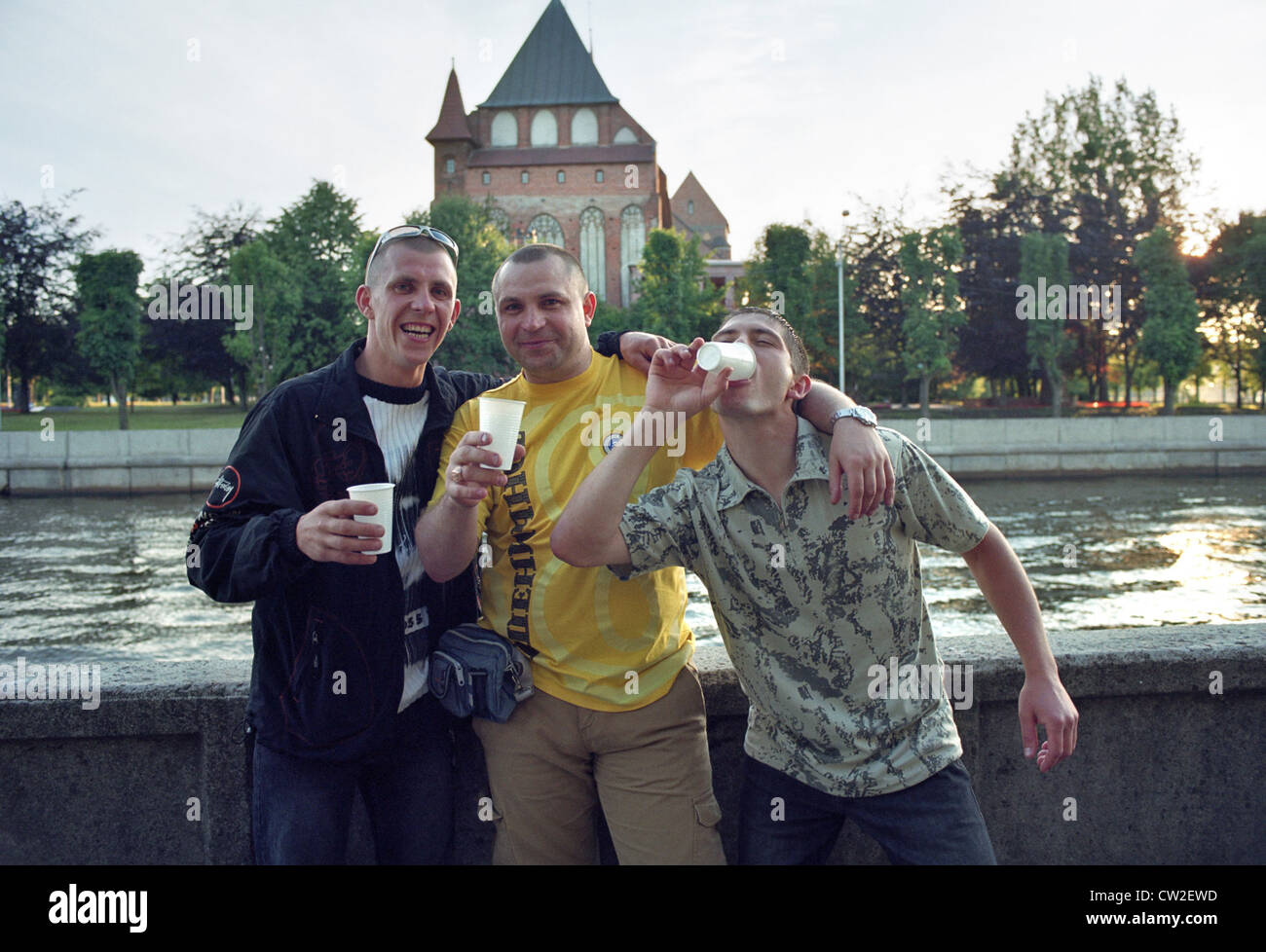 Three young men drink vodka, Kaliningrad, Russia Stock Photo - Alamy