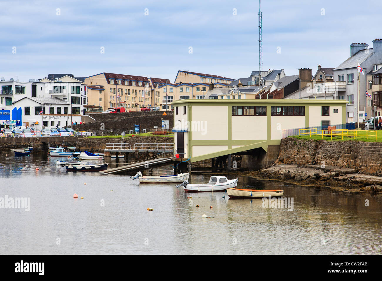 Portrush harbour with lifeboat station Stock Photo - Alamy