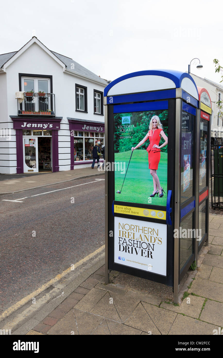 Phonebox with advert "Northern Ireland's Fashion Driver Stock Photo - Alamy