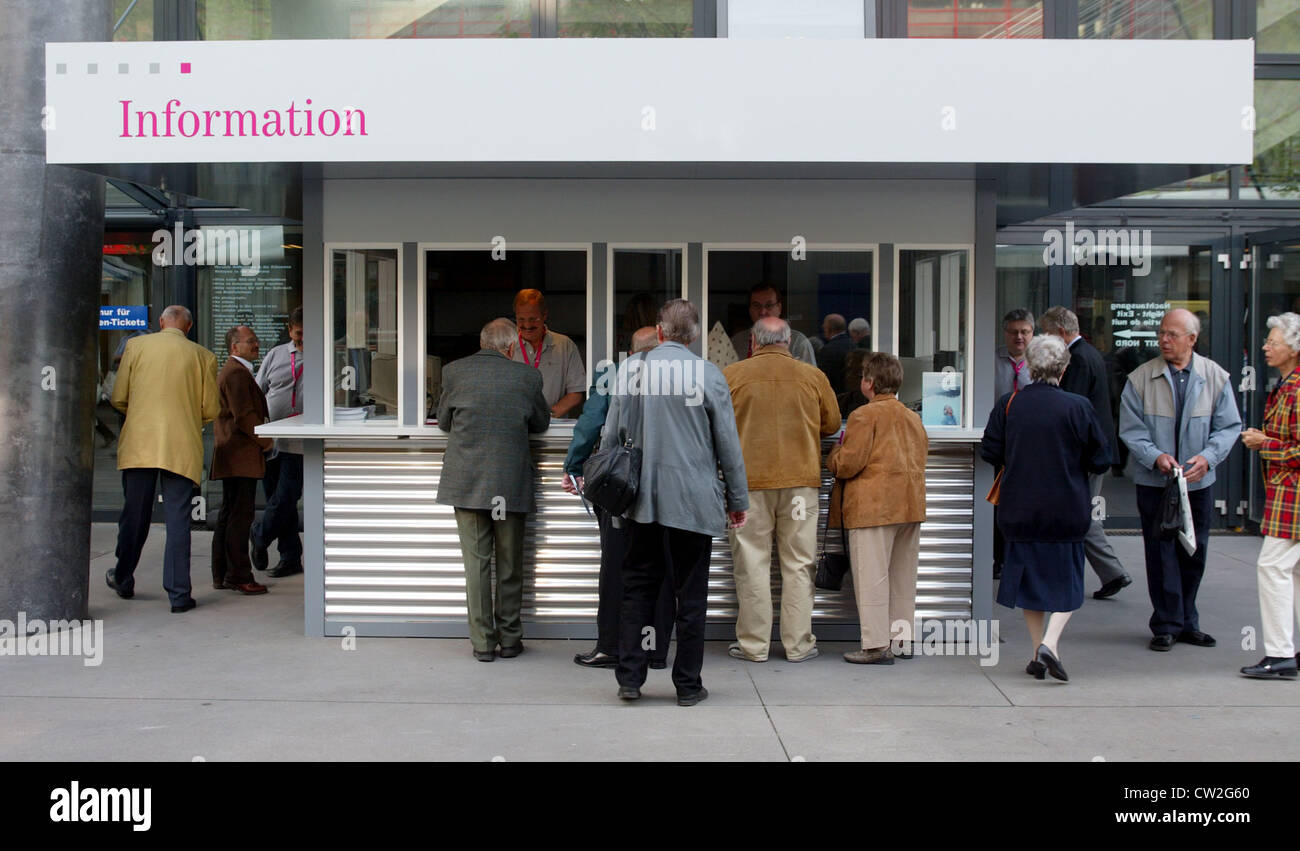 Business people information booth hi-res stock photography and images ...