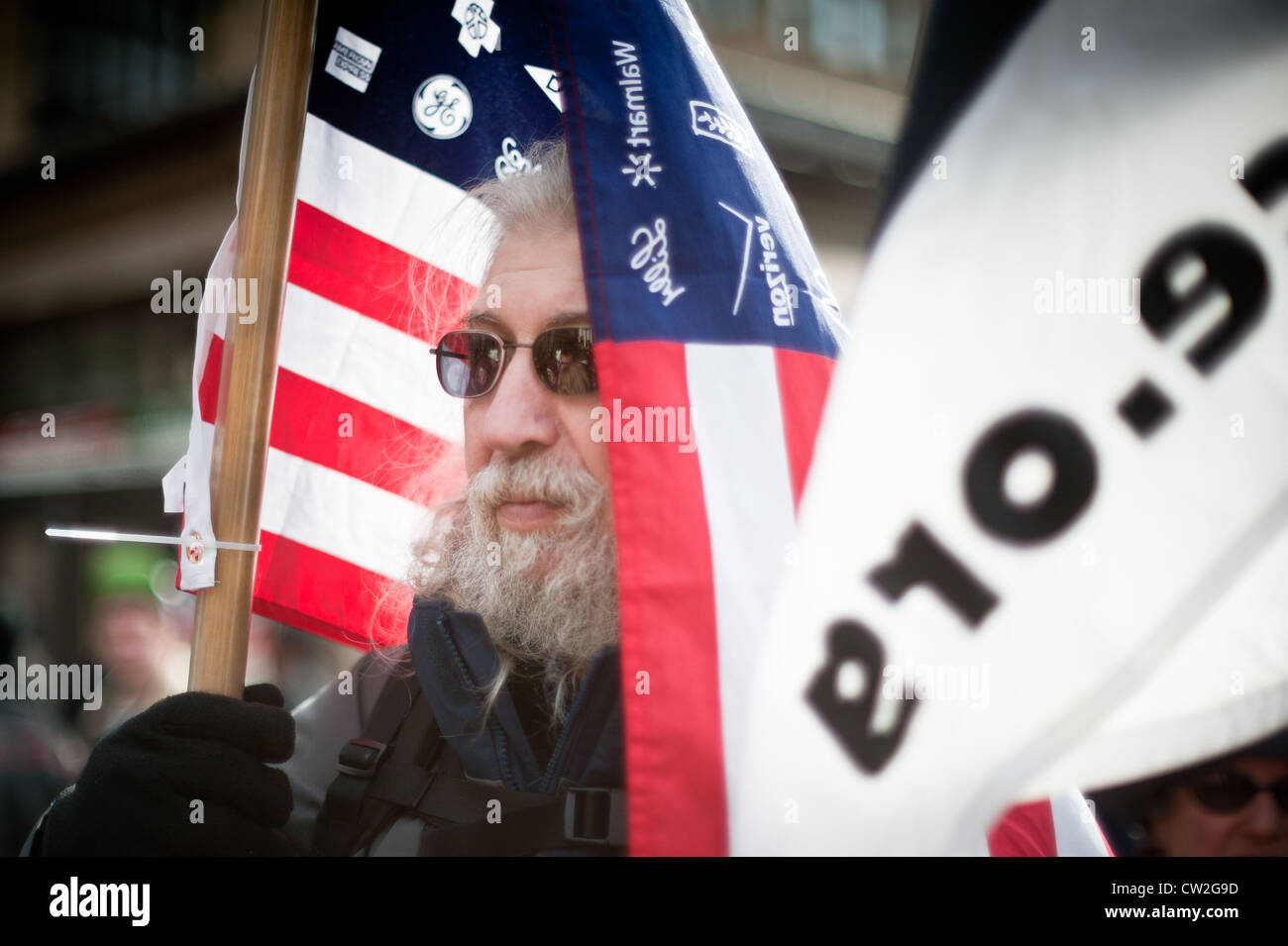 Citizens flying American flag in protest in Boston Massachusetts USA ...