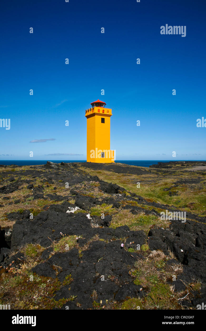 Landscape coastal view of the Icelandic Svortuloft Lighthouse on ...