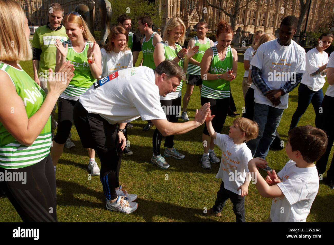 Shadow Chancellor Ed Balls (pictured) poses in his running gear with ...