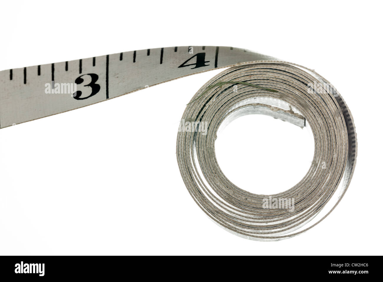 Measuring tape with inches made of cloth and isolated against white ...