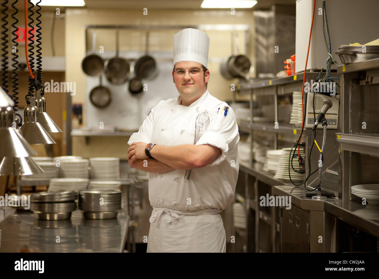 Chef in an industrial kitchen Stock Photo - Alamy