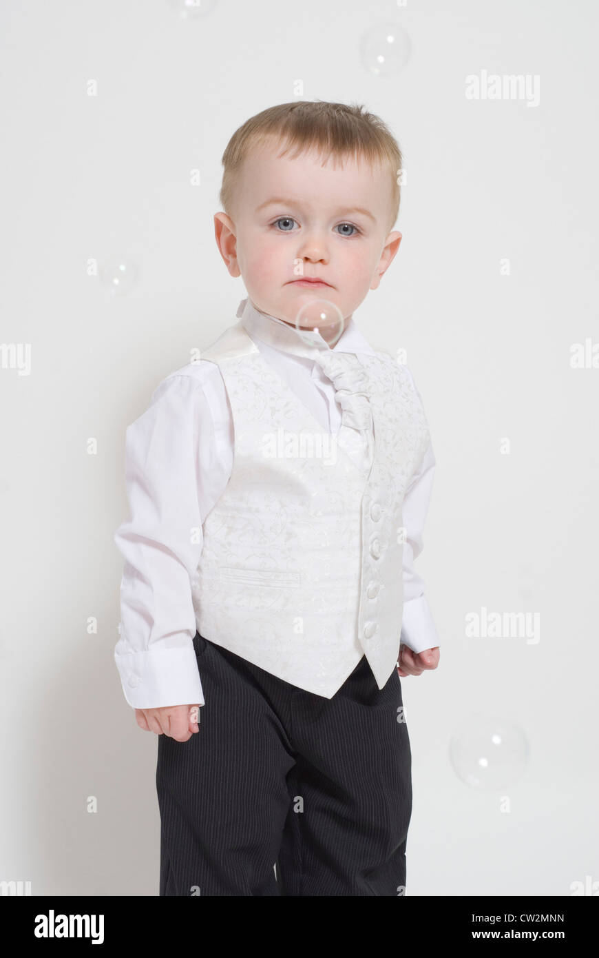 Little Boy, Toddler, Unamused by Bubbles, Dressed up in Smart Suit ...
