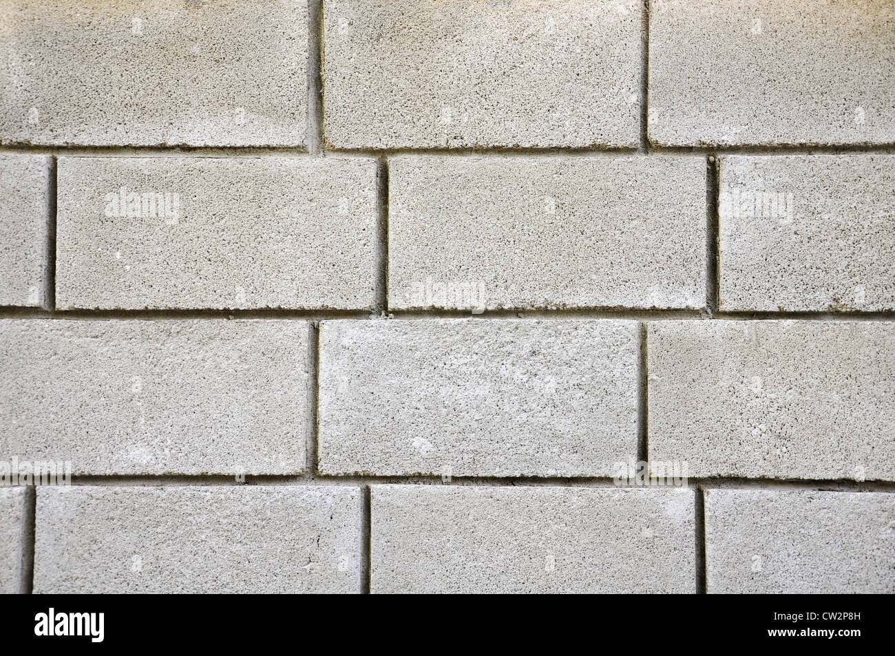 Background image with concrete bricks texture Stock Photo - Alamy