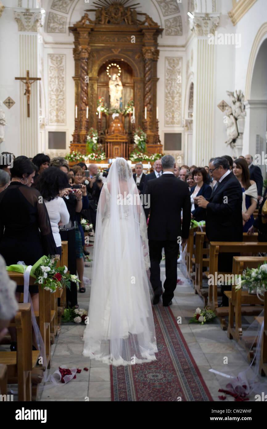 Couple getting married in a Catholic church, Sicily Italy Stock Photo ...