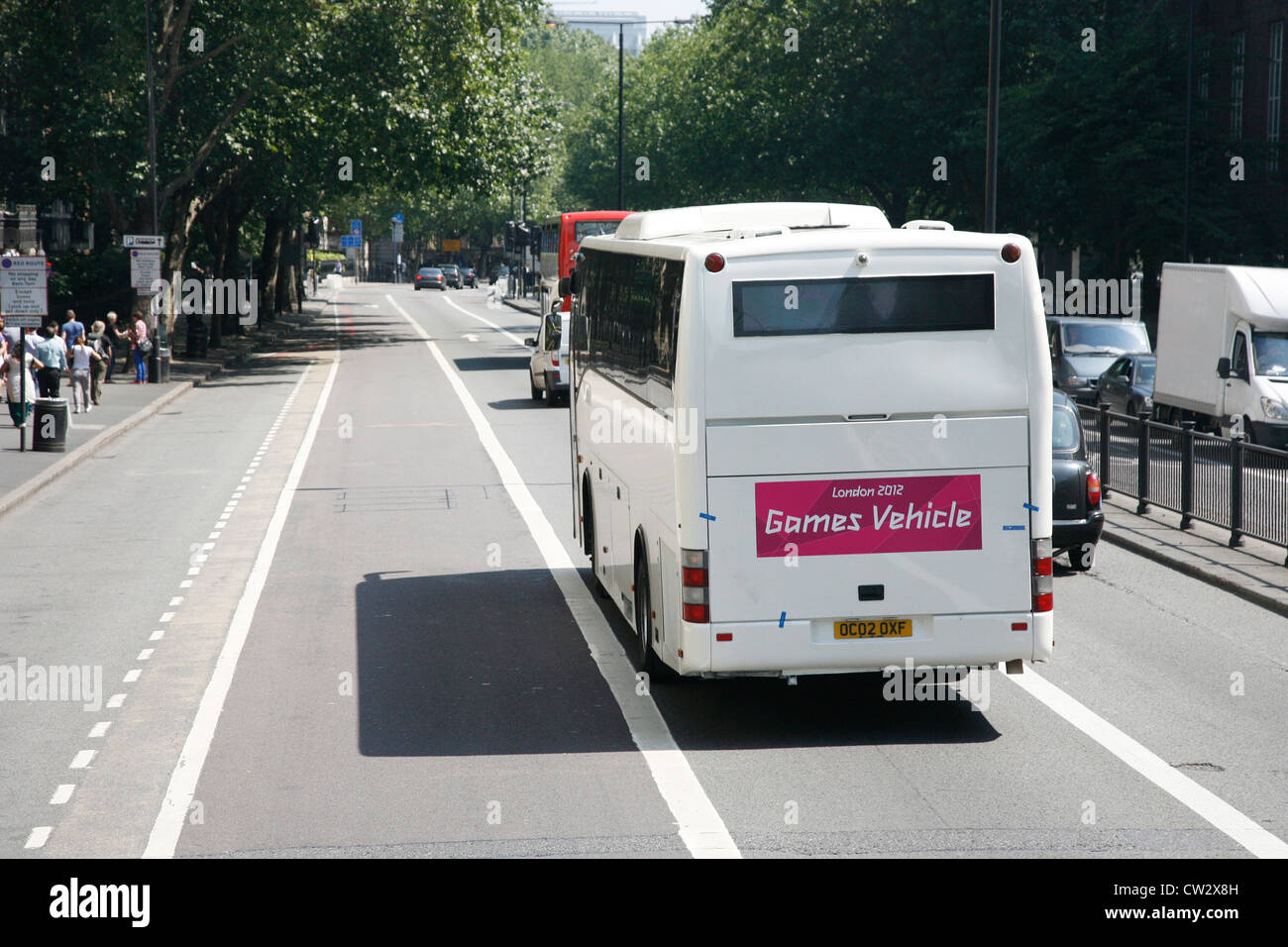 London, UK - July 26, 2012: Olympic athletes' bus on Games route ...