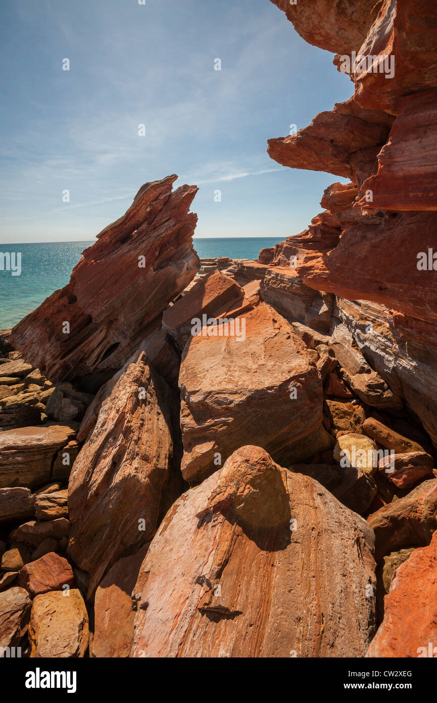 The Red Cliffs in Stark Contrast with the Deep Blue Sky and Ocean at ...