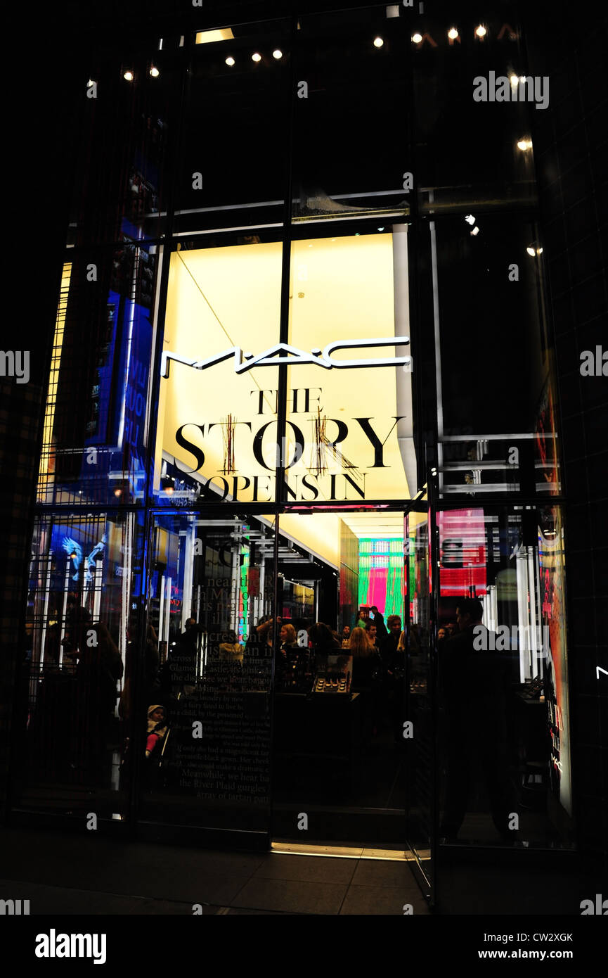 Shop window portrait colourful electric lights interior, shoppers and ...