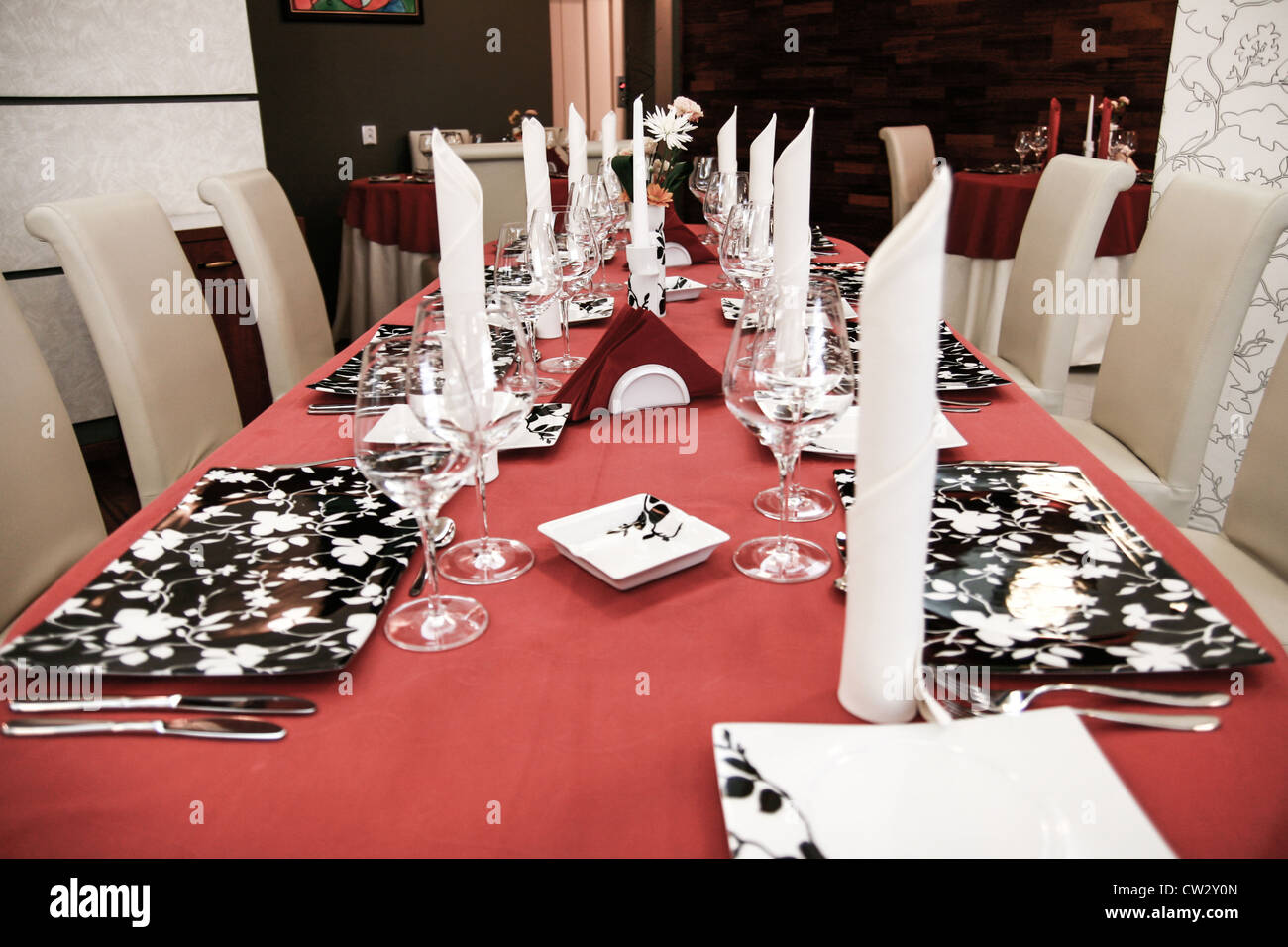Table set for dinner in modern restaurant Stock Photo - Alamy