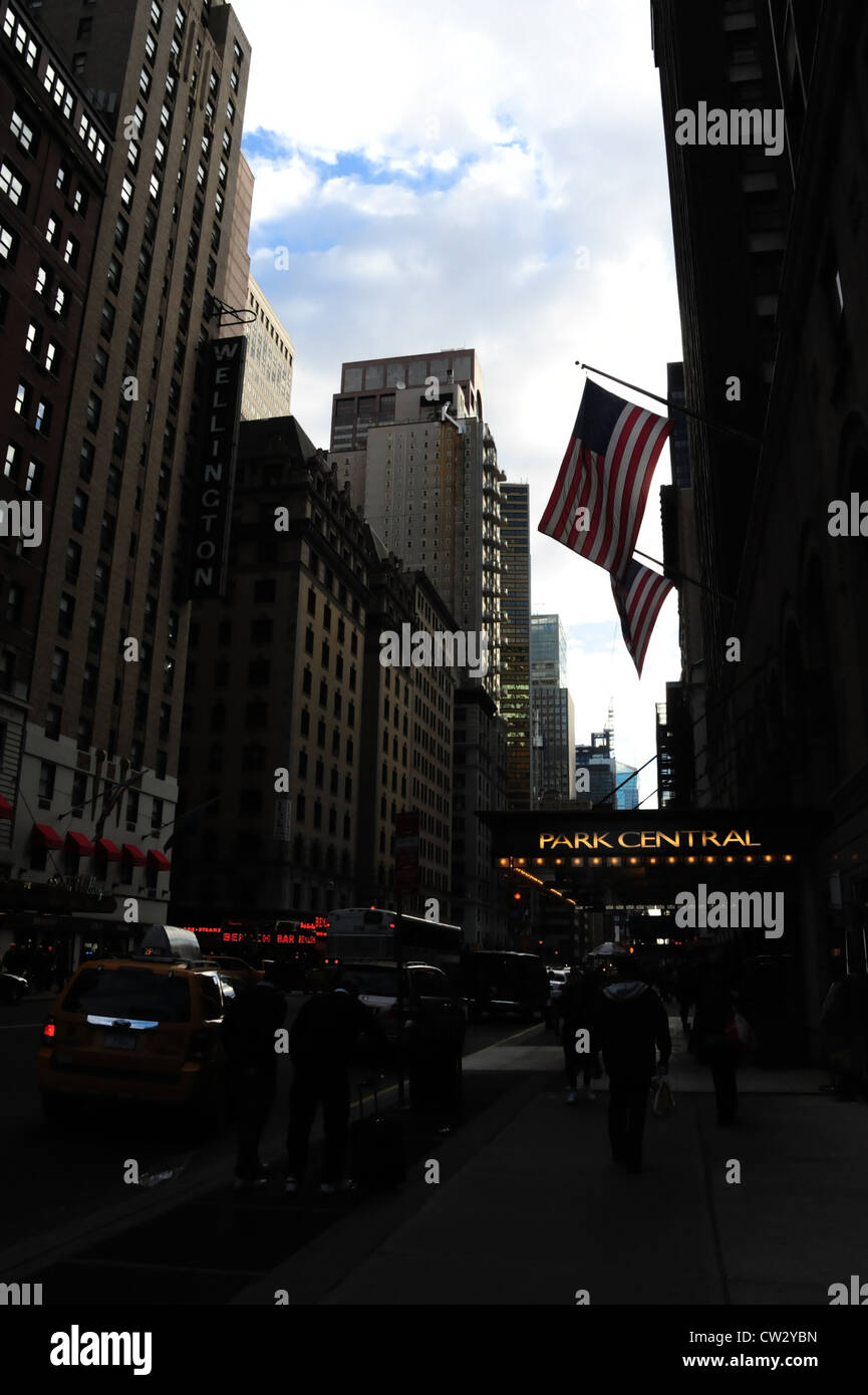 Grey sky rush-hour urban alley portrait, cars, American Flags, electric ...