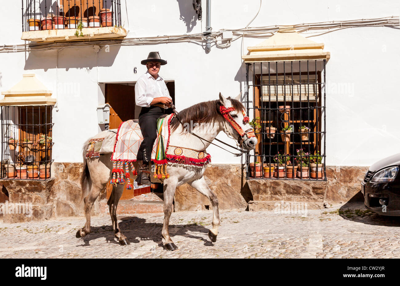 Ronda, Andalusia, Spain, Europe. Horseman riding through the street ...