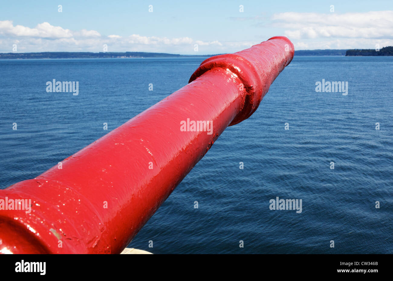 Bright red Tugboat Fire fighting Nozzle with Puget Sound in the ...