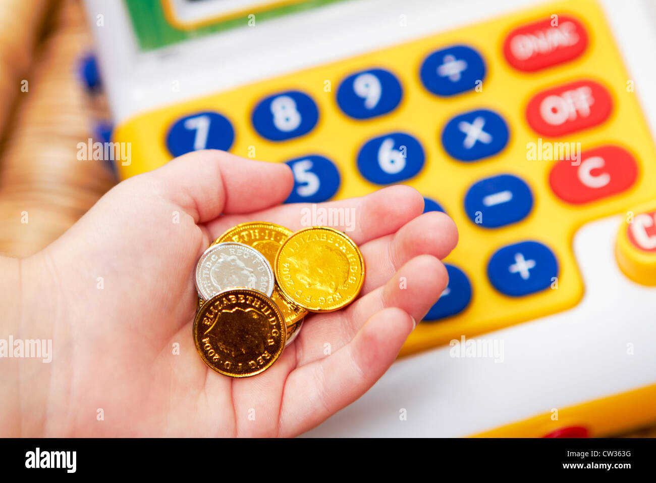 Child buying money cash register hi-res stock photography and images ...