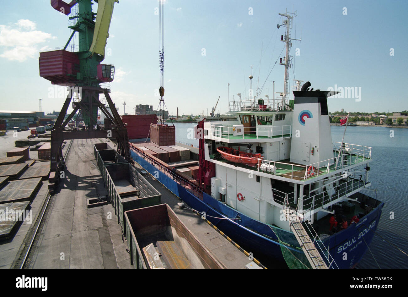 Loading a ship with containers in the commercial port of Kaliningrad ...
