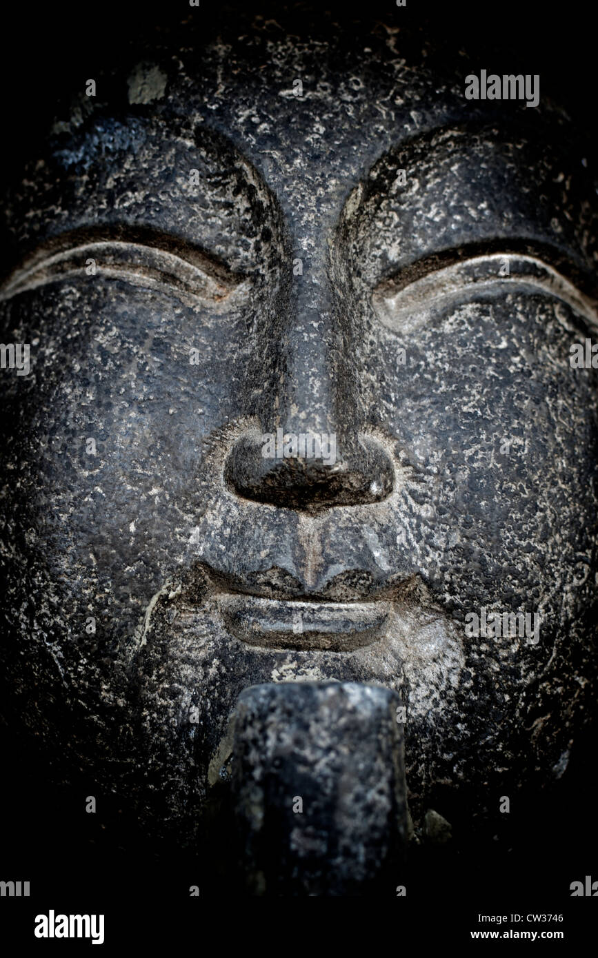 Rough stone buddha face hi-res stock photography and images - Alamy