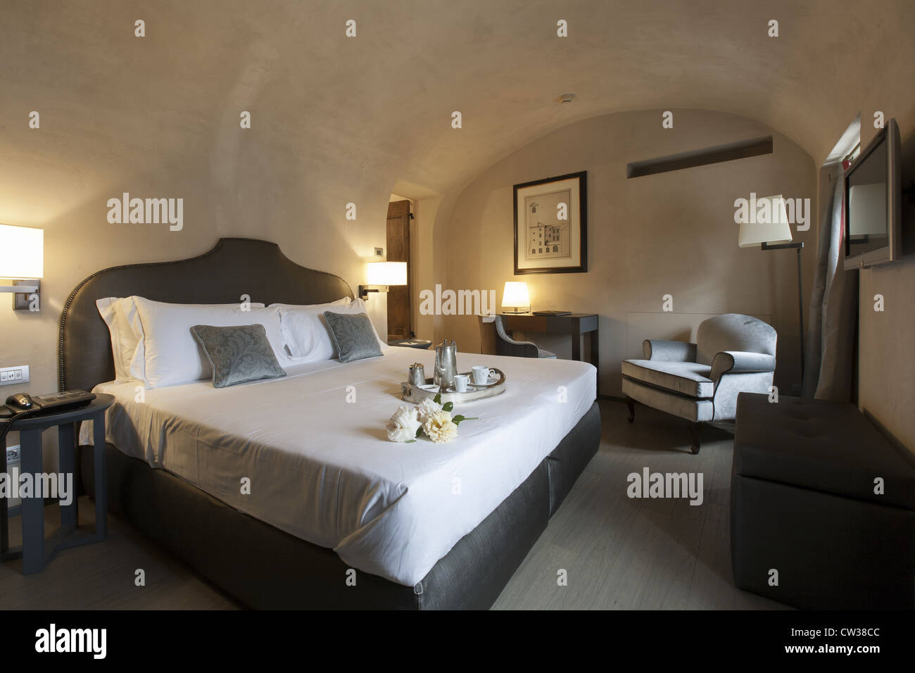 Bedroom in a classic traditional hotel in Italy Stock Photo - Alamy